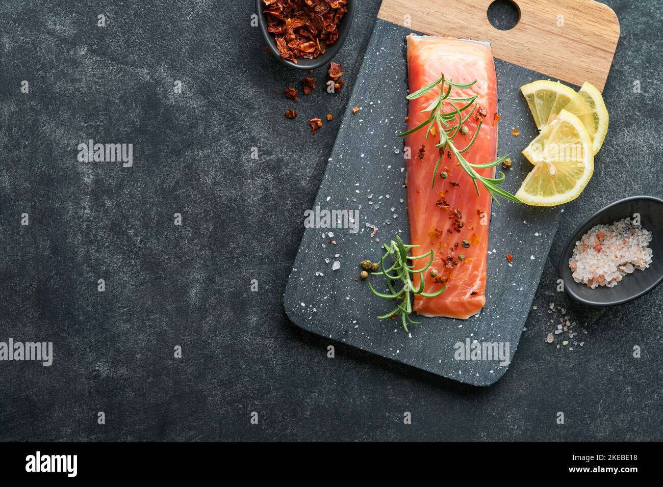 Salmon fish piece. Fresh raw salmon fish piece on marble board stand ...