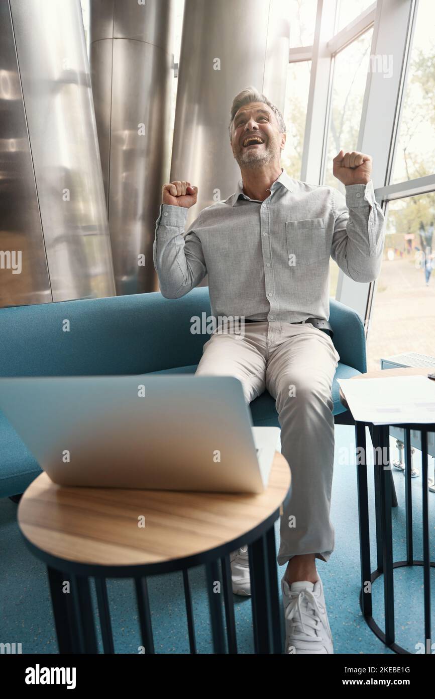 Boss of company reacts joyfully to victory of new project Stock Photo ...