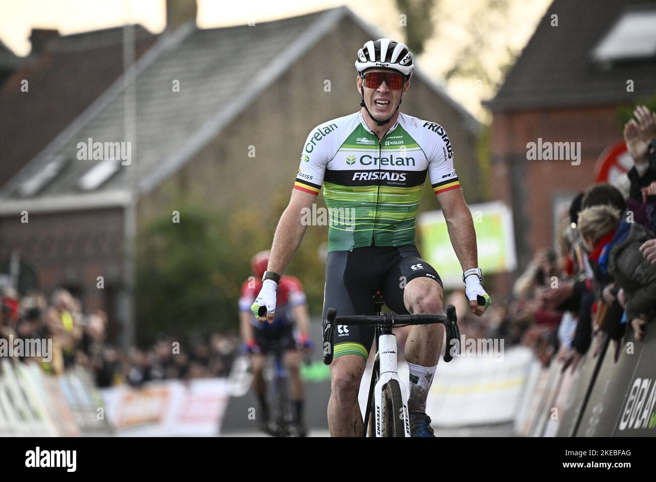 Belgian Laurens Sweeck celebrates as he wins the men's elite race at ...