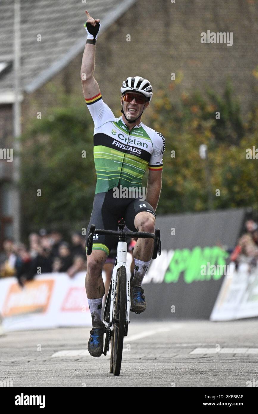 Belgian Laurens Sweeck celebrates as he wins the men's elite race at ...