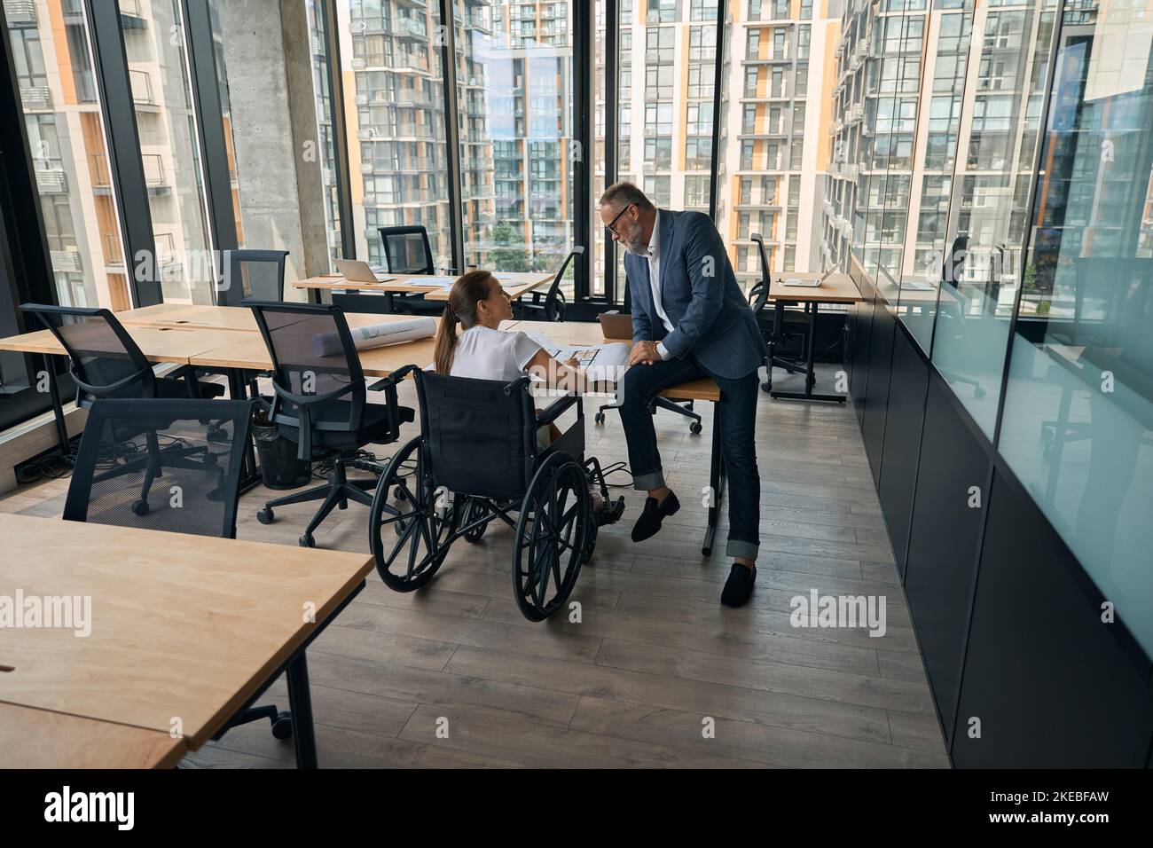 Male office employee disability in hi-res stock photography and images - Alamy