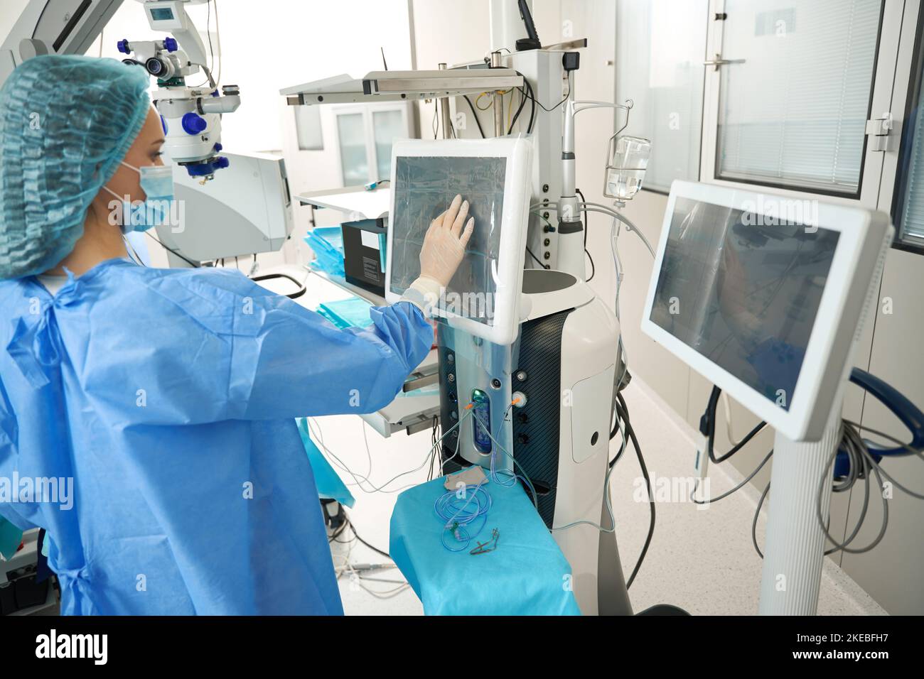 Lady preparing equipment for surgery in hospital Stock Photo - Alamy