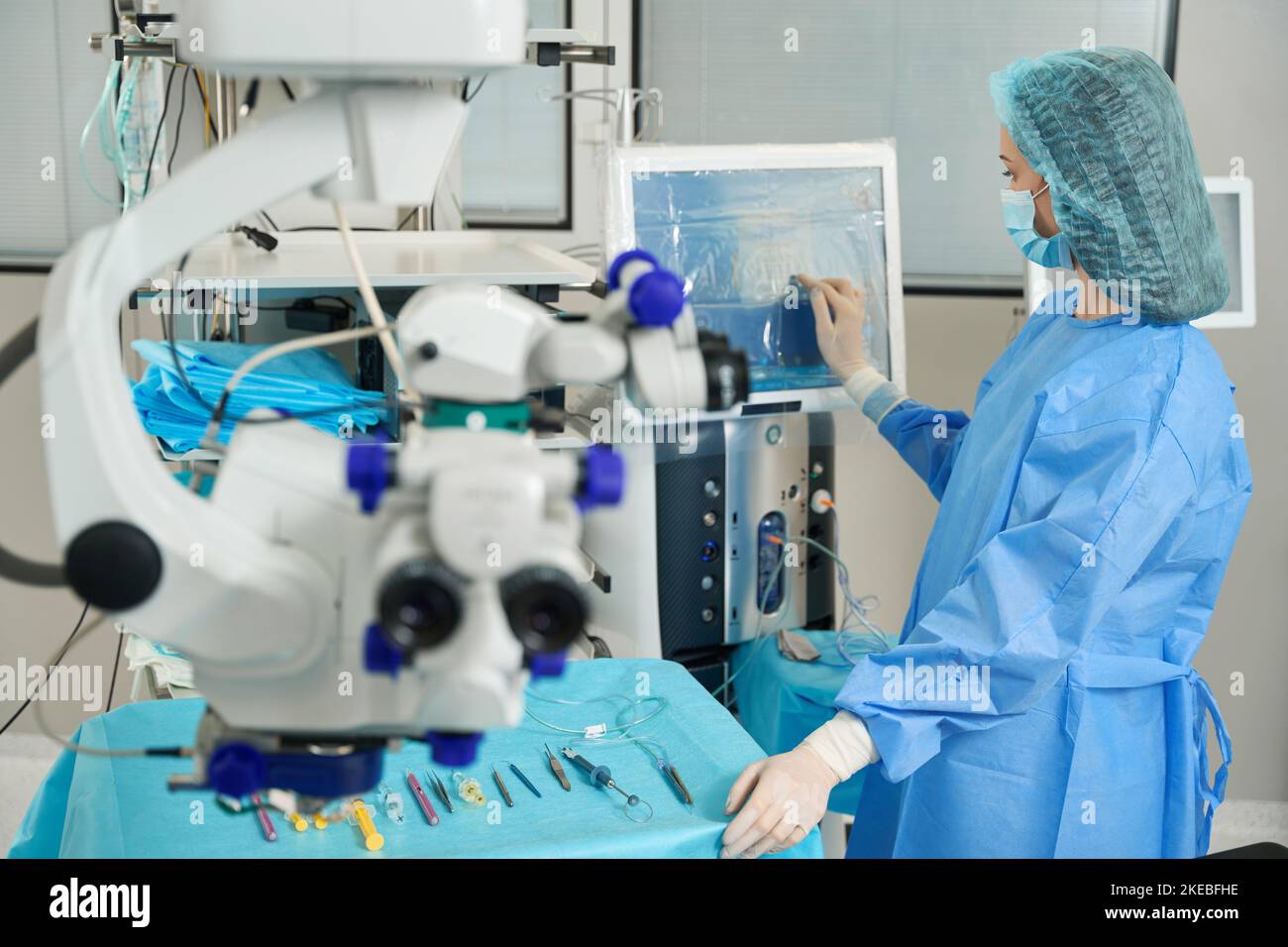 Female surgeon preparing instruments hi-res stock photography and ...