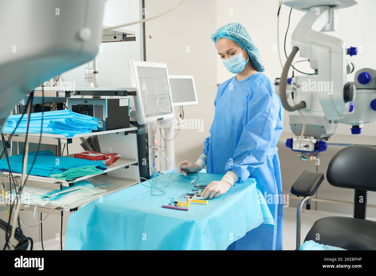 Doctor preparing surgery instruments hi-res stock photography and ...