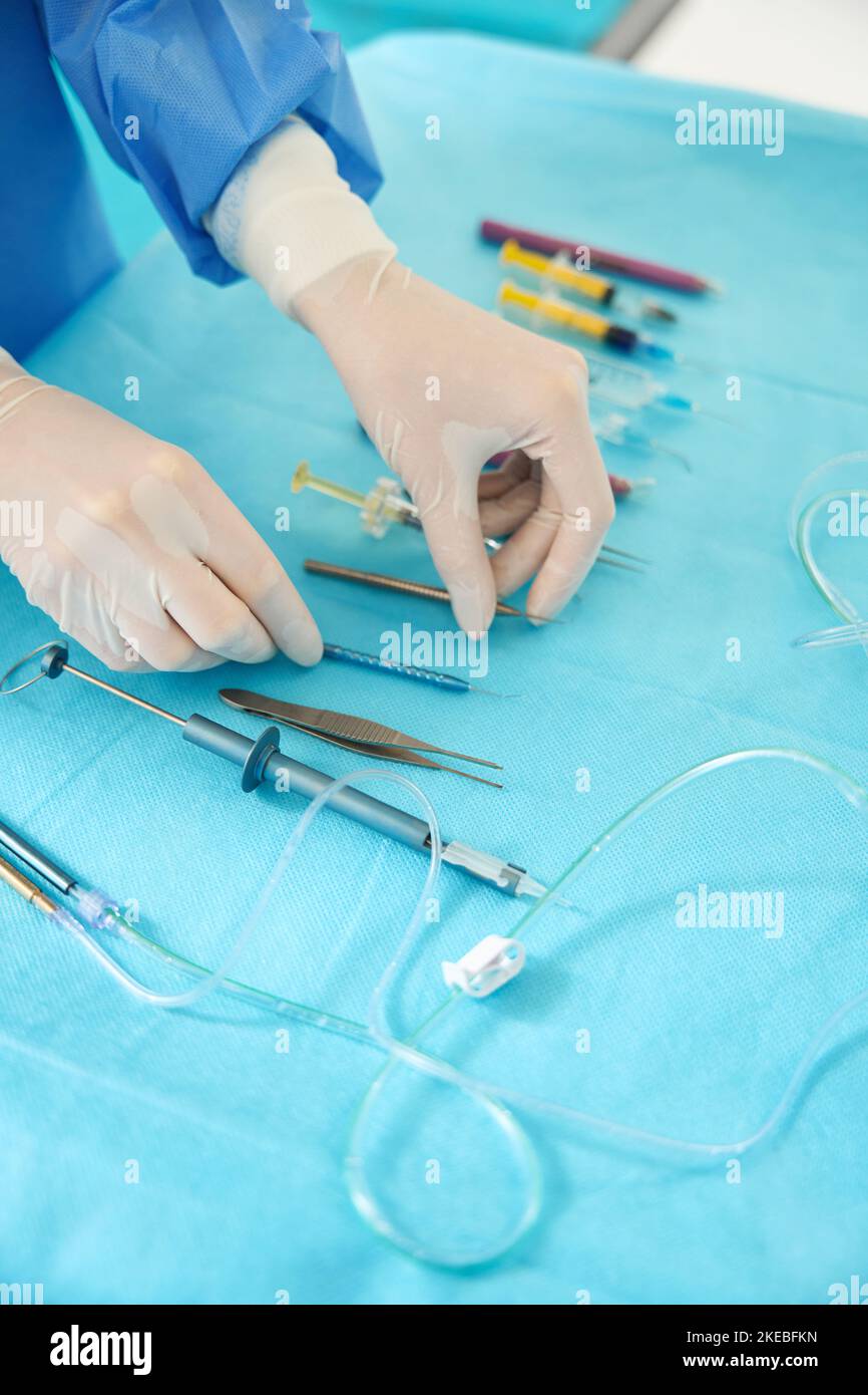 Doctor preparing instruments for operation in hospital Stock Photo - Alamy