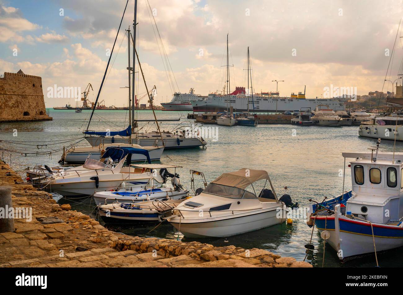 Small and big ships moored in Venetian harbour in Heraklion, Crete ...