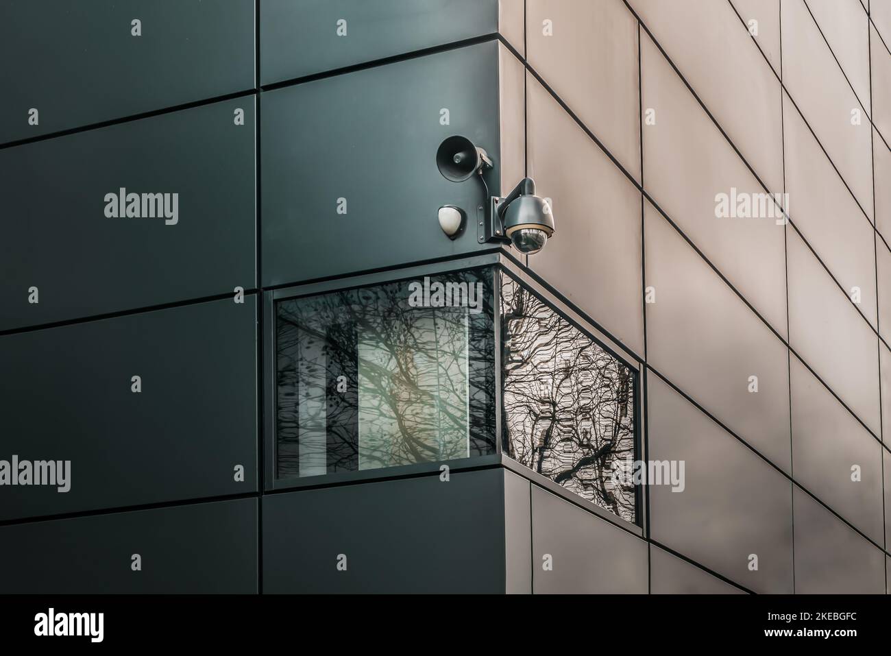 Surveillance camera for mounted on outside wall of Modern building. The ...