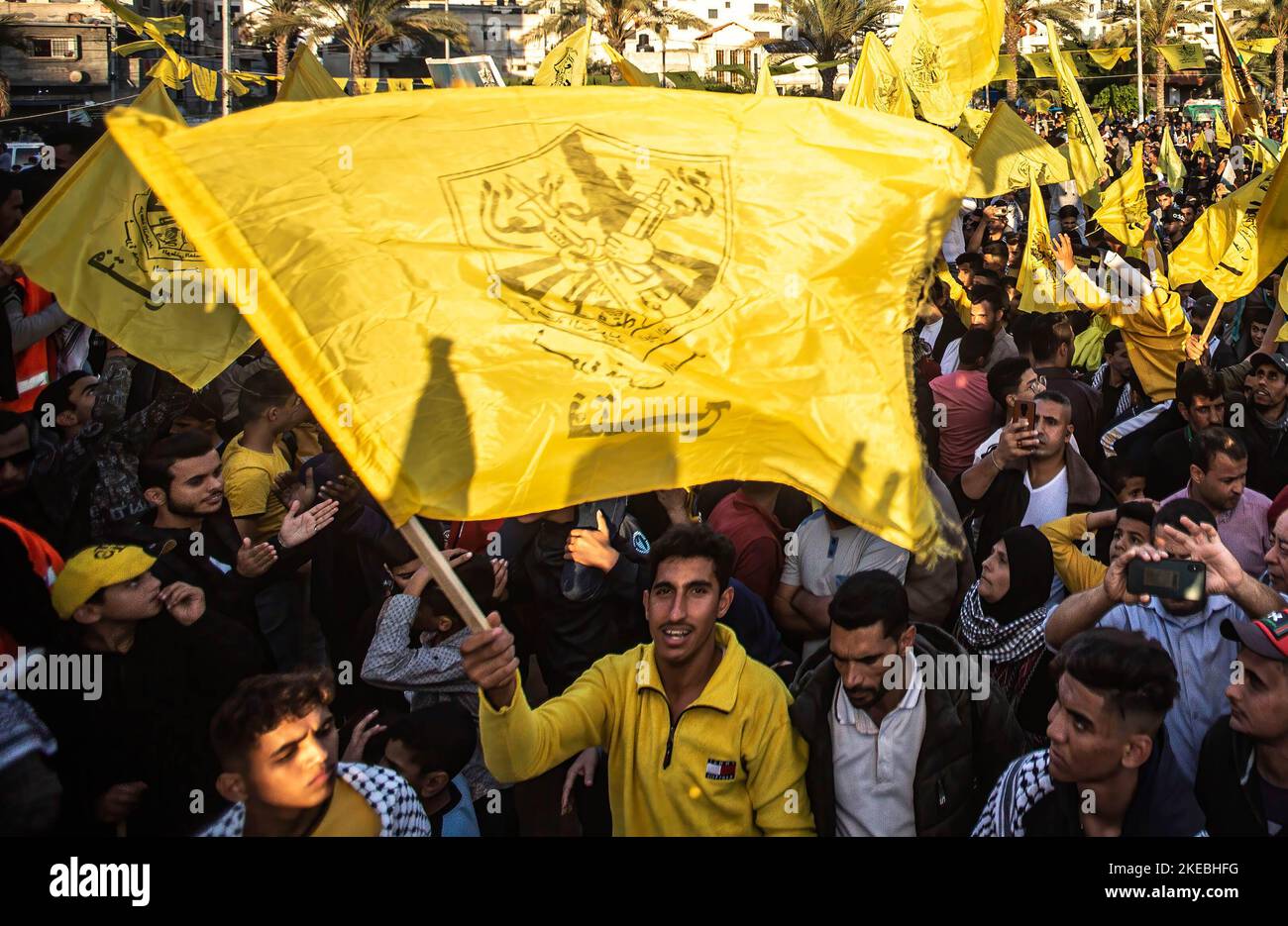 Gaza, Palestine. 10th Nov, 2022. A Palestinian waves a yellow flag of ...