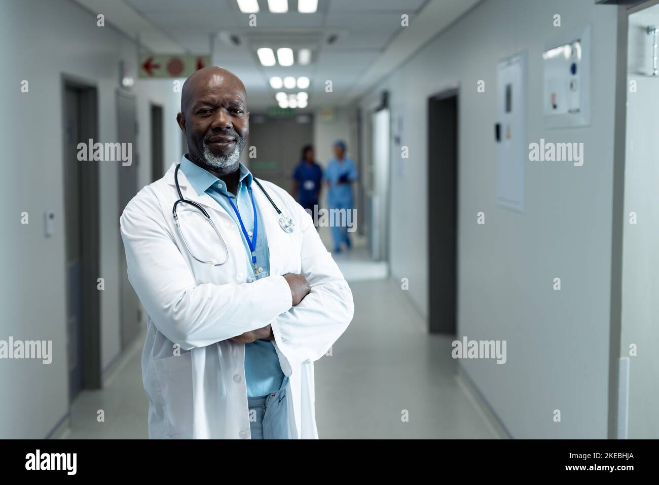 Portrait of happy senior african american male doctor in hospital ...