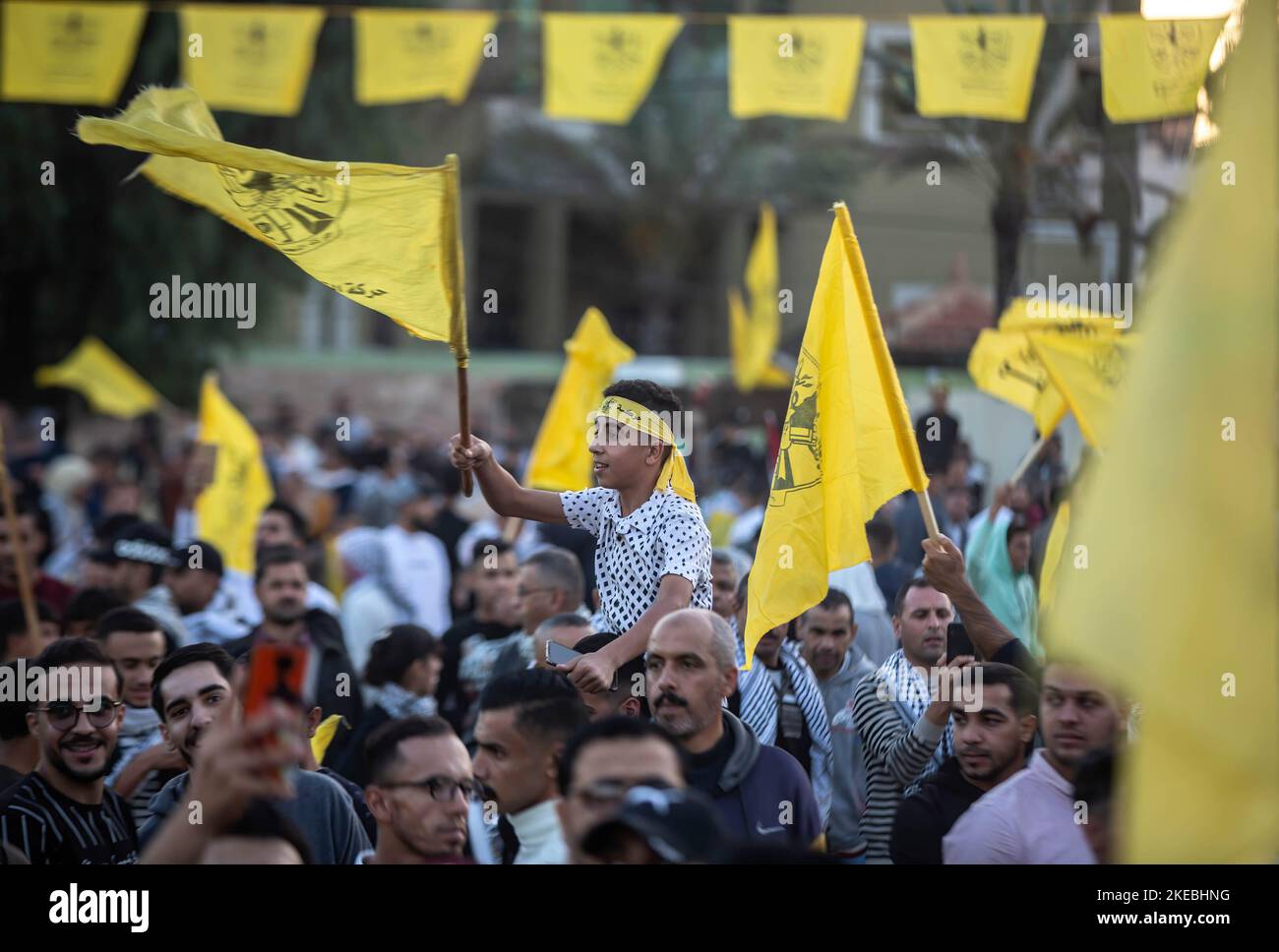 Gaza, Palestine. 10th Nov, 2022. A Palestinian boy waves the yellow ...