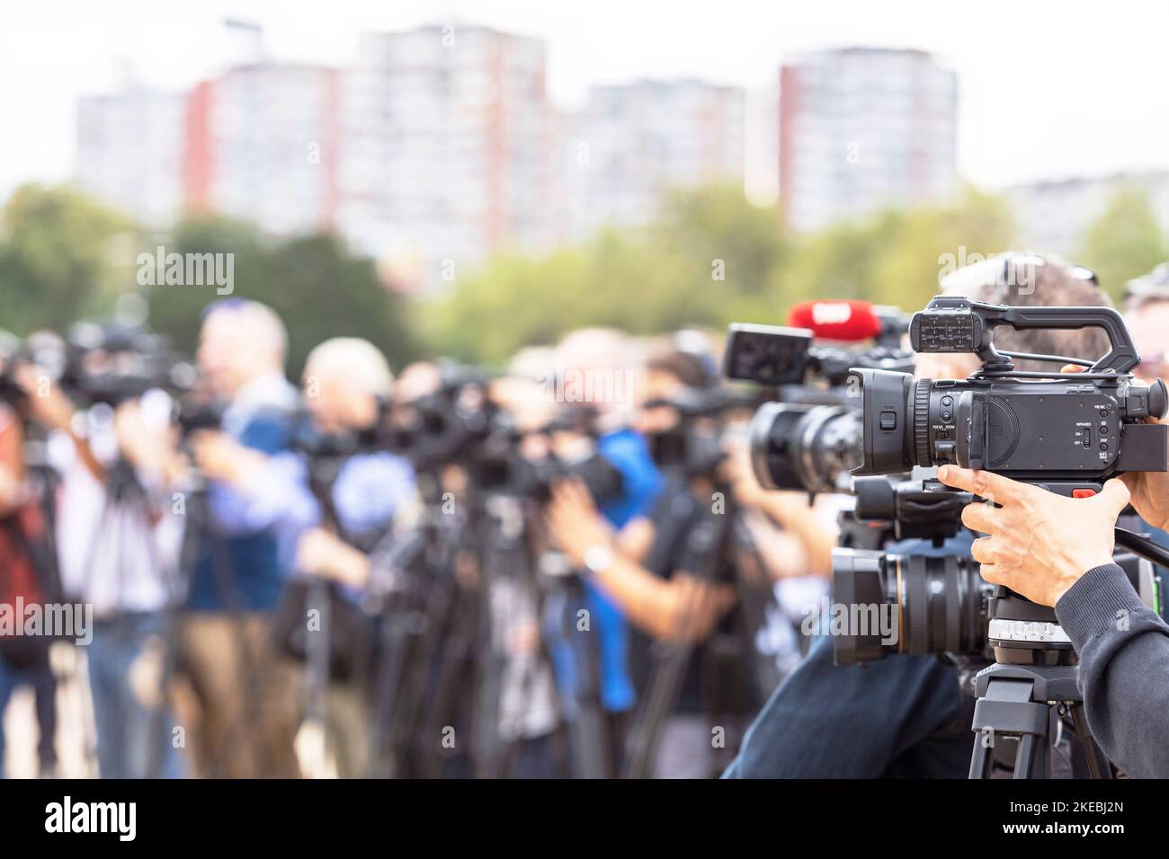 Press conference. Filming media event with a television camera Stock ...