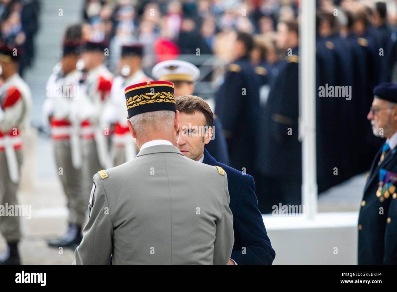 French President Emmanuel Macron lays a wreath of flowers during a ...