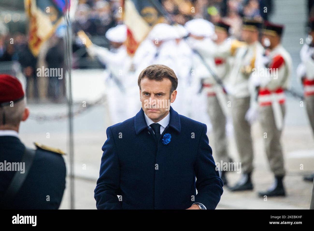 French President Emmanuel Macron lays a wreath of flowers during a ...
