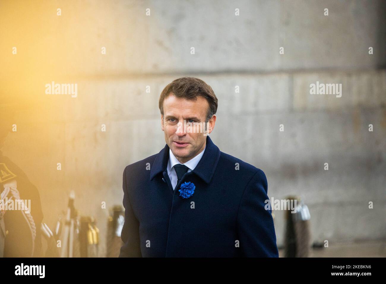 French President Emmanuel Macron lays a wreath of flowers during a ...