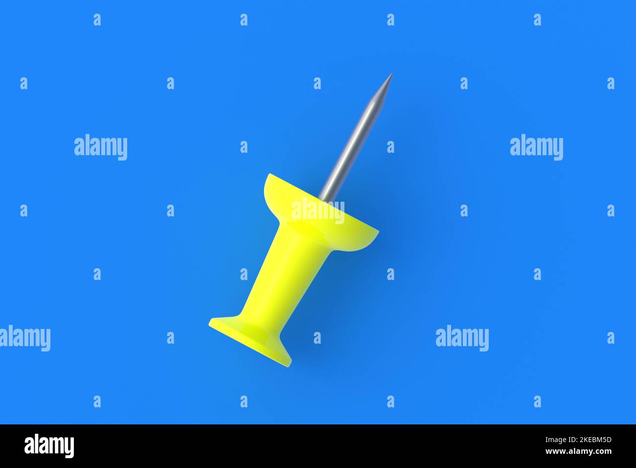 Yellow push pin on blue background. Stationery tools. Office equipment ...