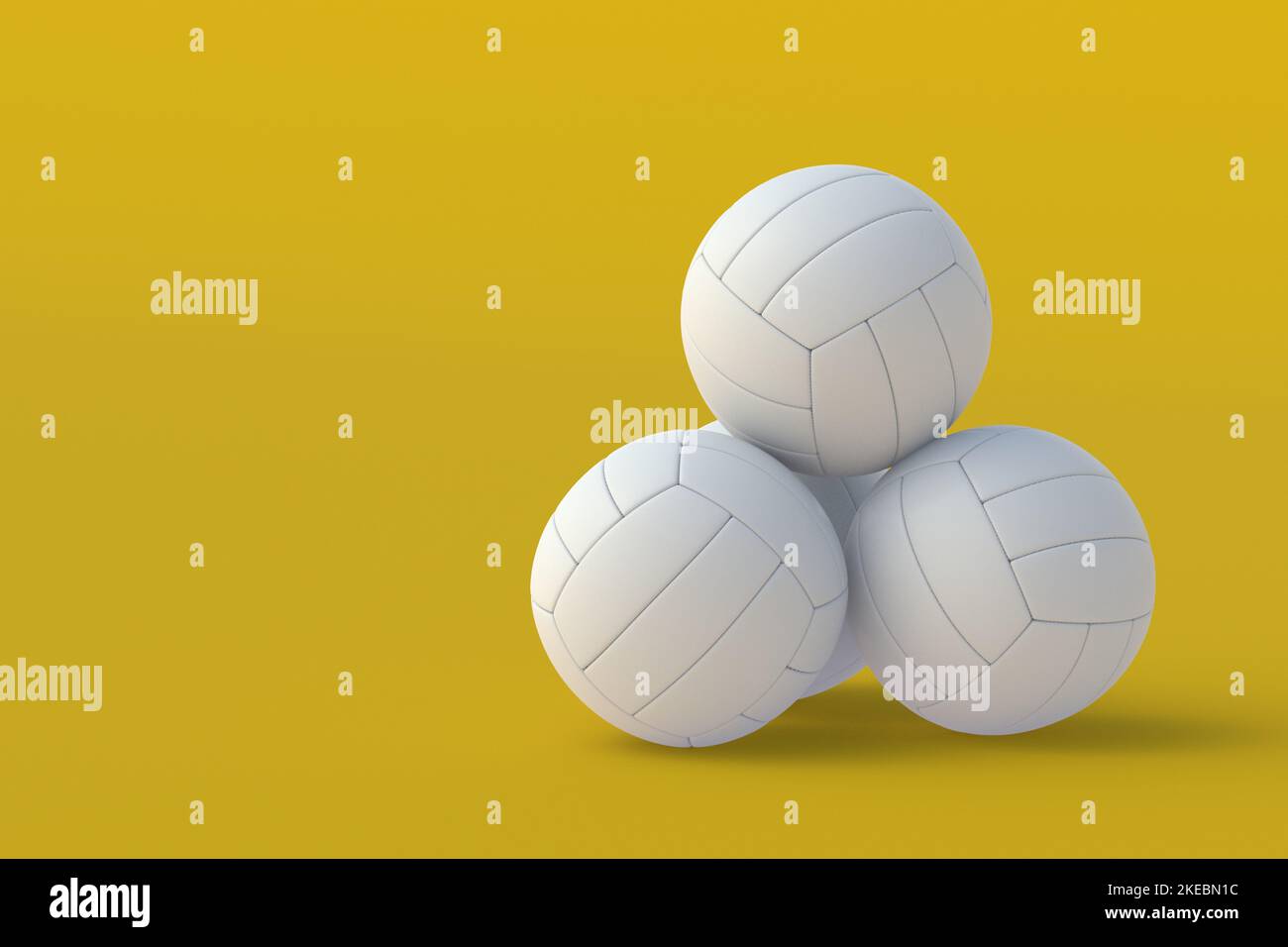 Stack of volleyball balls on orange background. Sports equipment ...