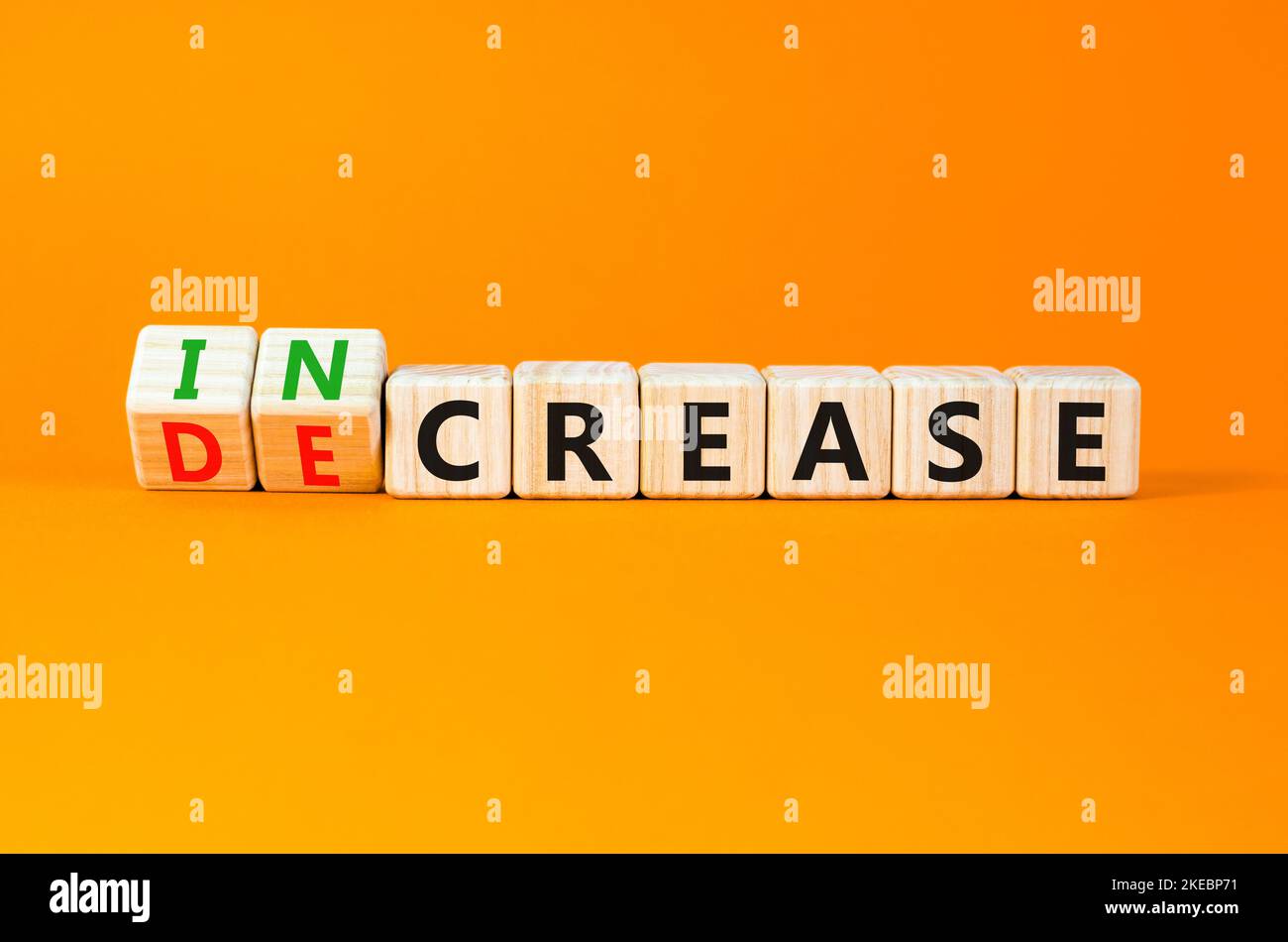 Increase or decrease symbol. Concept words Increase and Decrease on wooden cubes. Beautiful ...