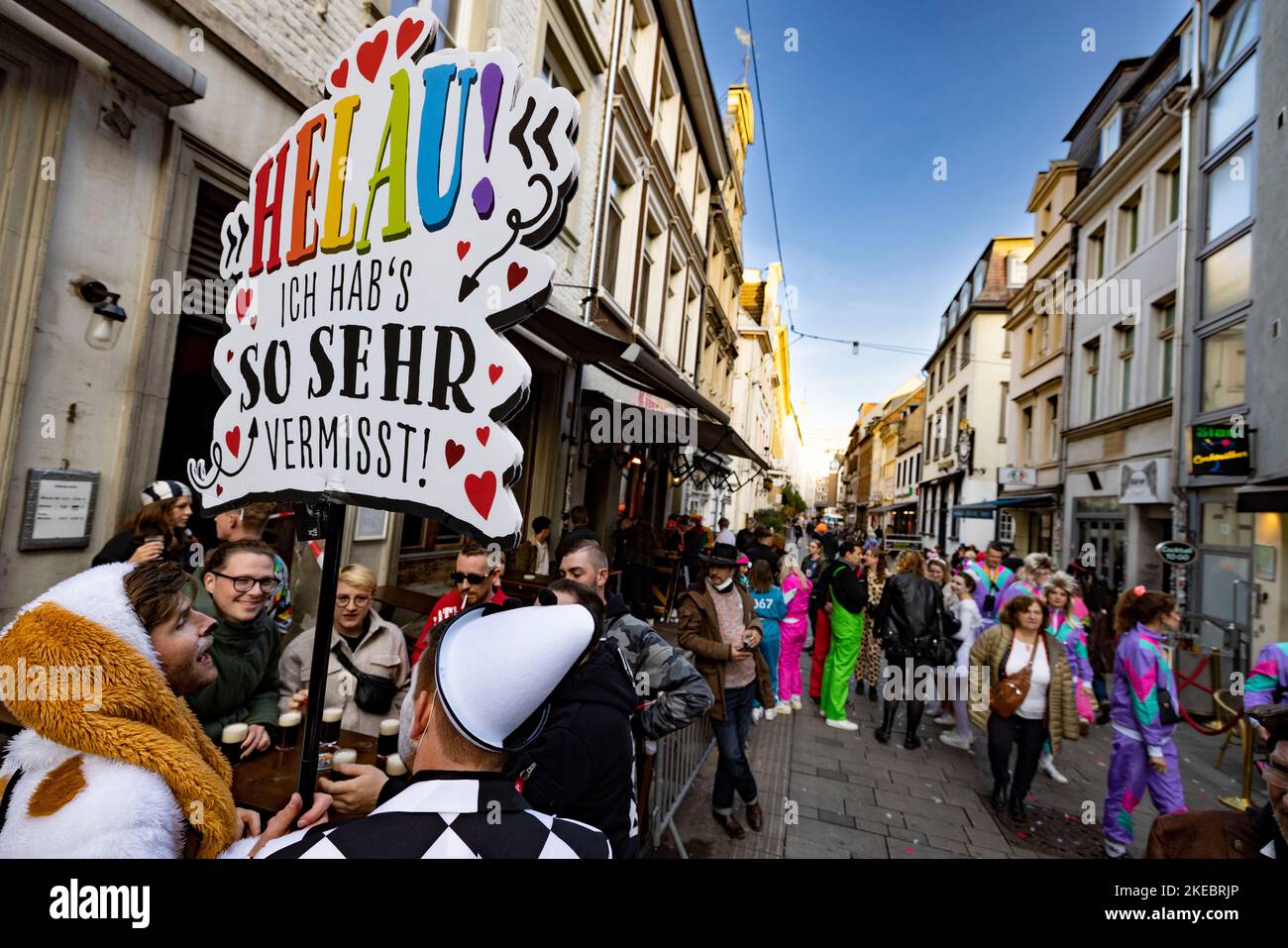 Duesseldorf, Germany. 11th Nov, 2022. Carnivalists with a sign "Helau ...