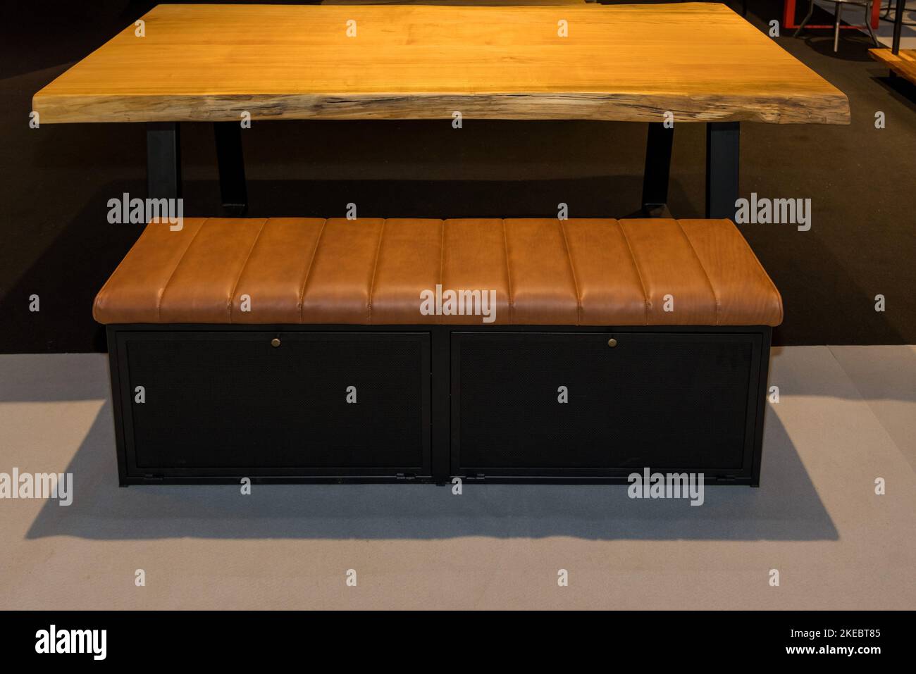 Brown Leather Bench Seat With Black Box Storage Stock Photo - Alamy