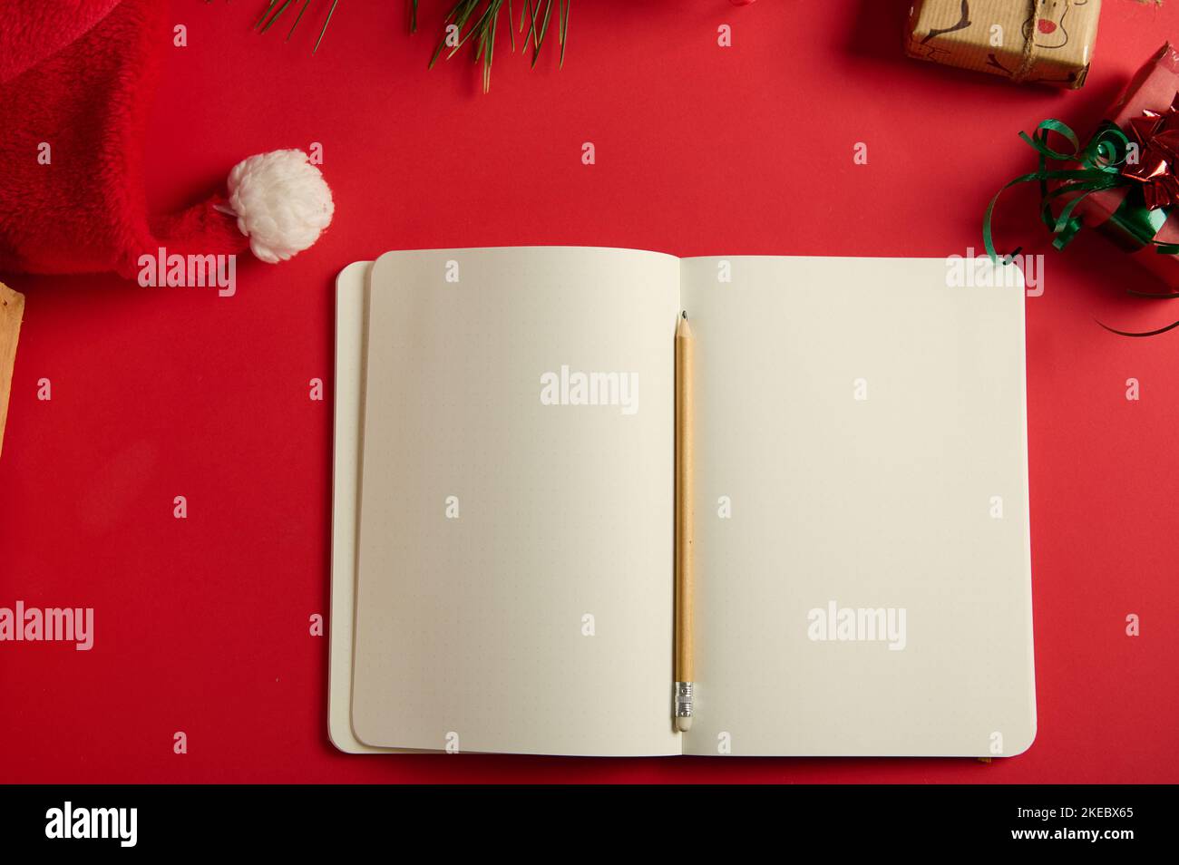 Still life with an open notepad with blank paper sheets and copy space ...