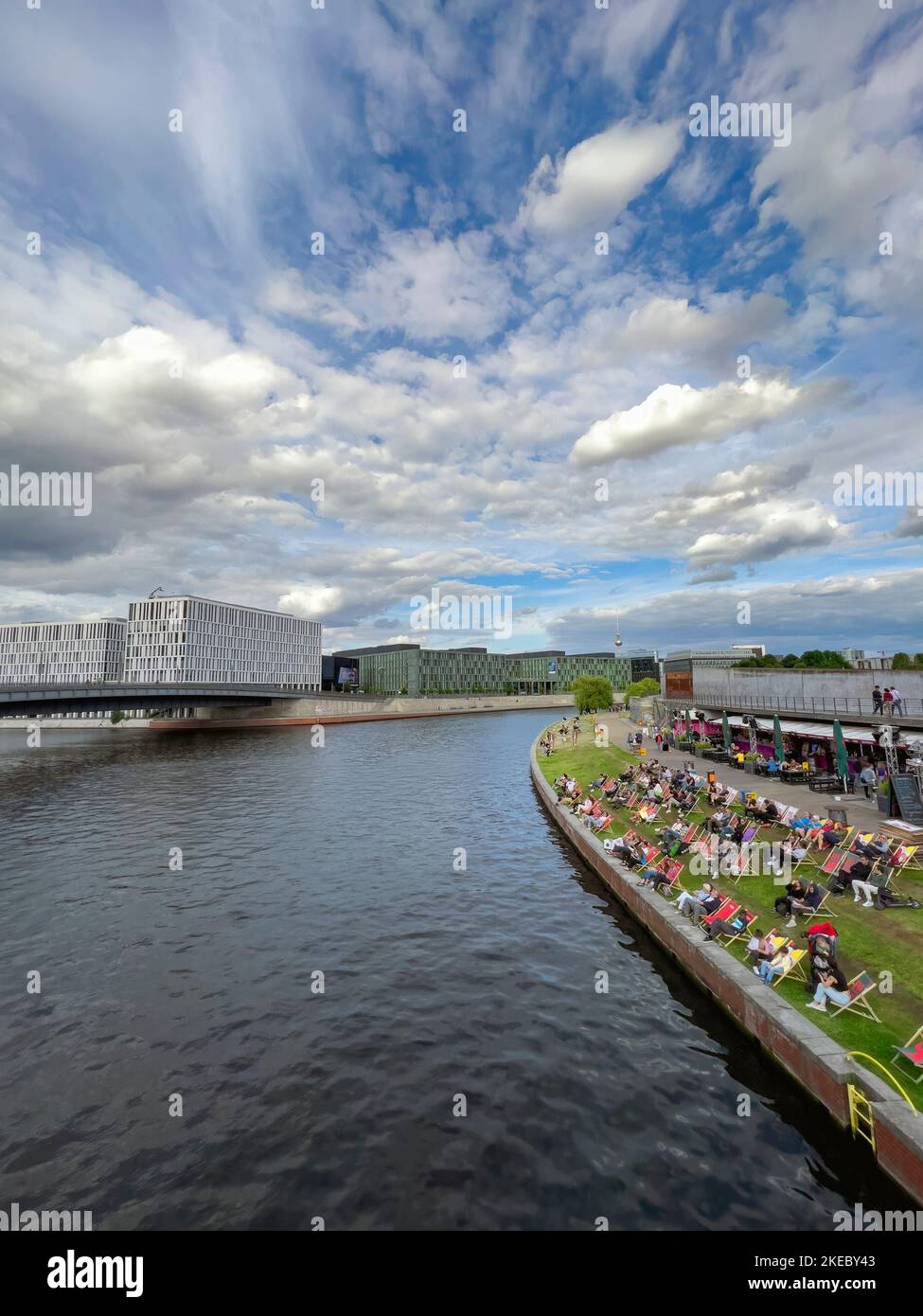 on the bank cafe in summer next to river Spree in Mitte Berlin, Germany ...