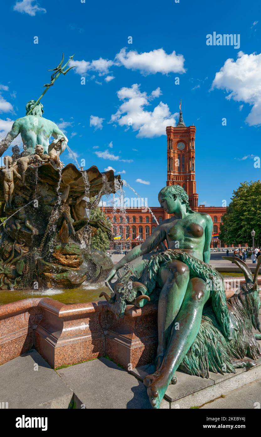 Neptune fountain with red city hall in background, Berlin, Germany ...