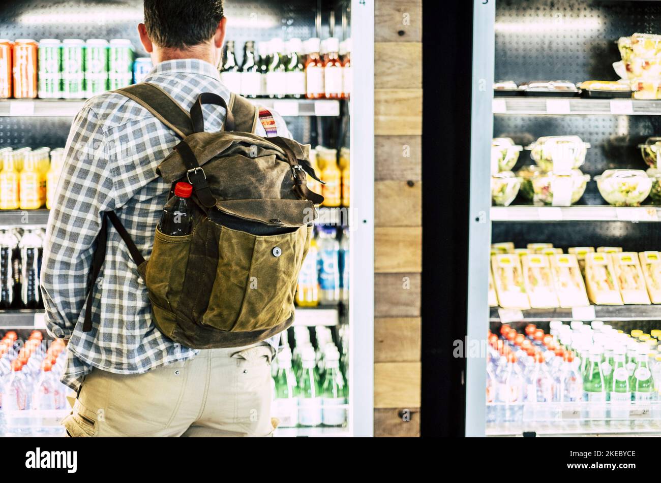 Business man in front of vending machine at station hi-res stock ...