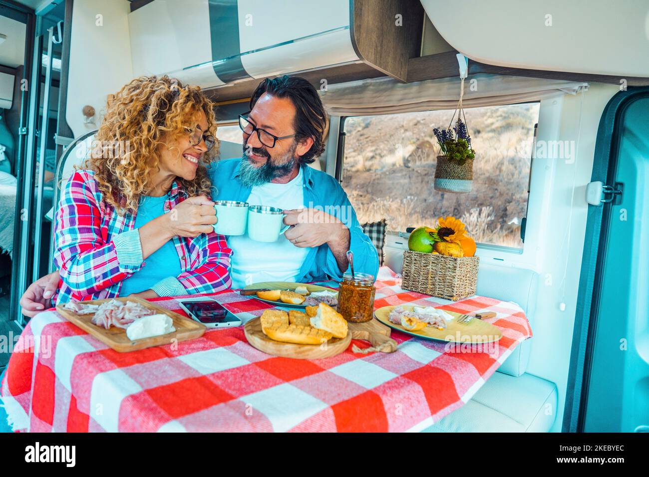 Travel and love relationship with man and woman enjoying and clinking ...