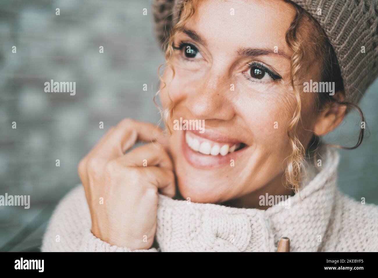 Close up portrait of cheerful attractive woman. Focus on eye, defocused ...