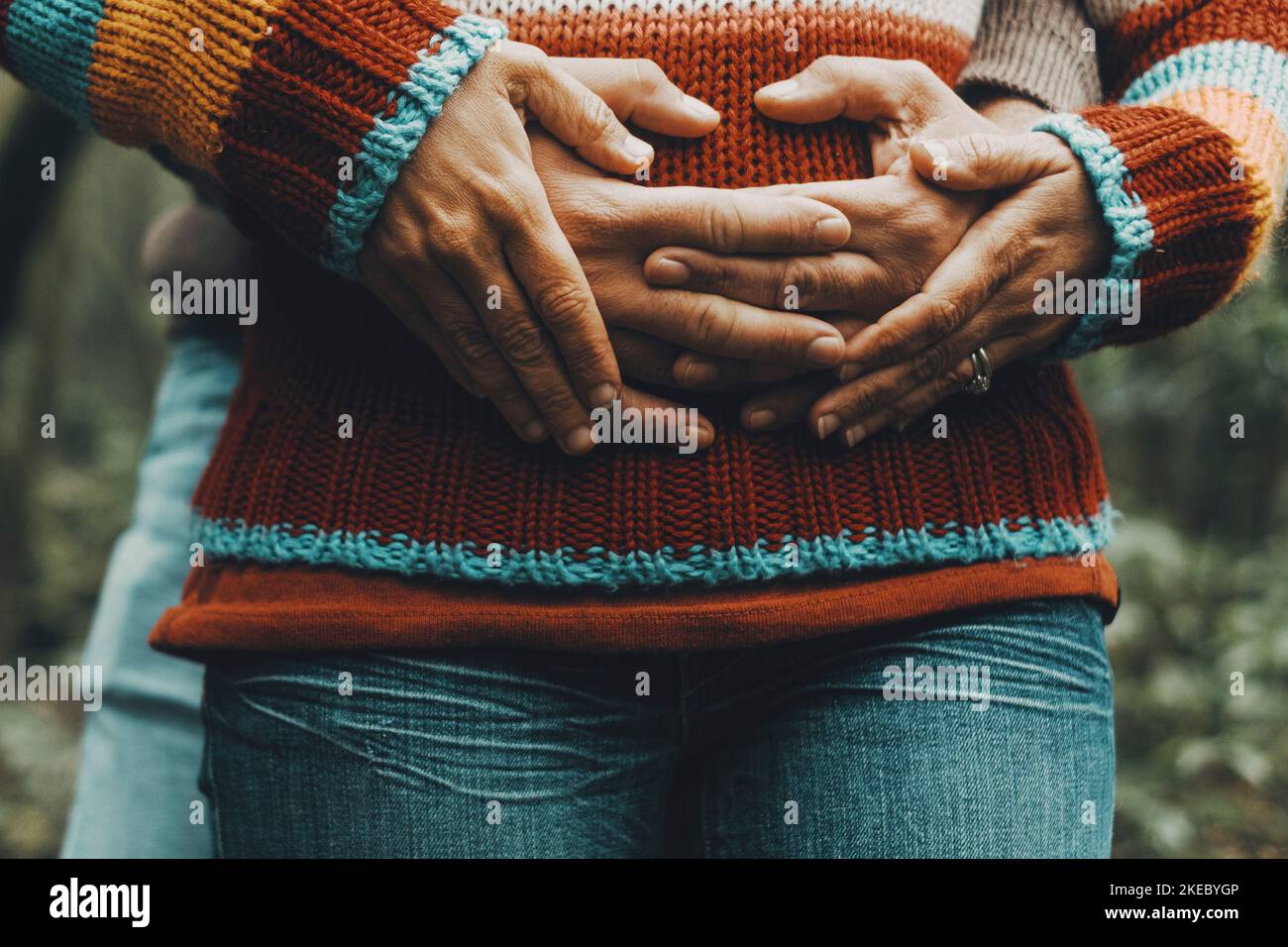 Two hands touch intimate close up hi-res stock photography and images ...