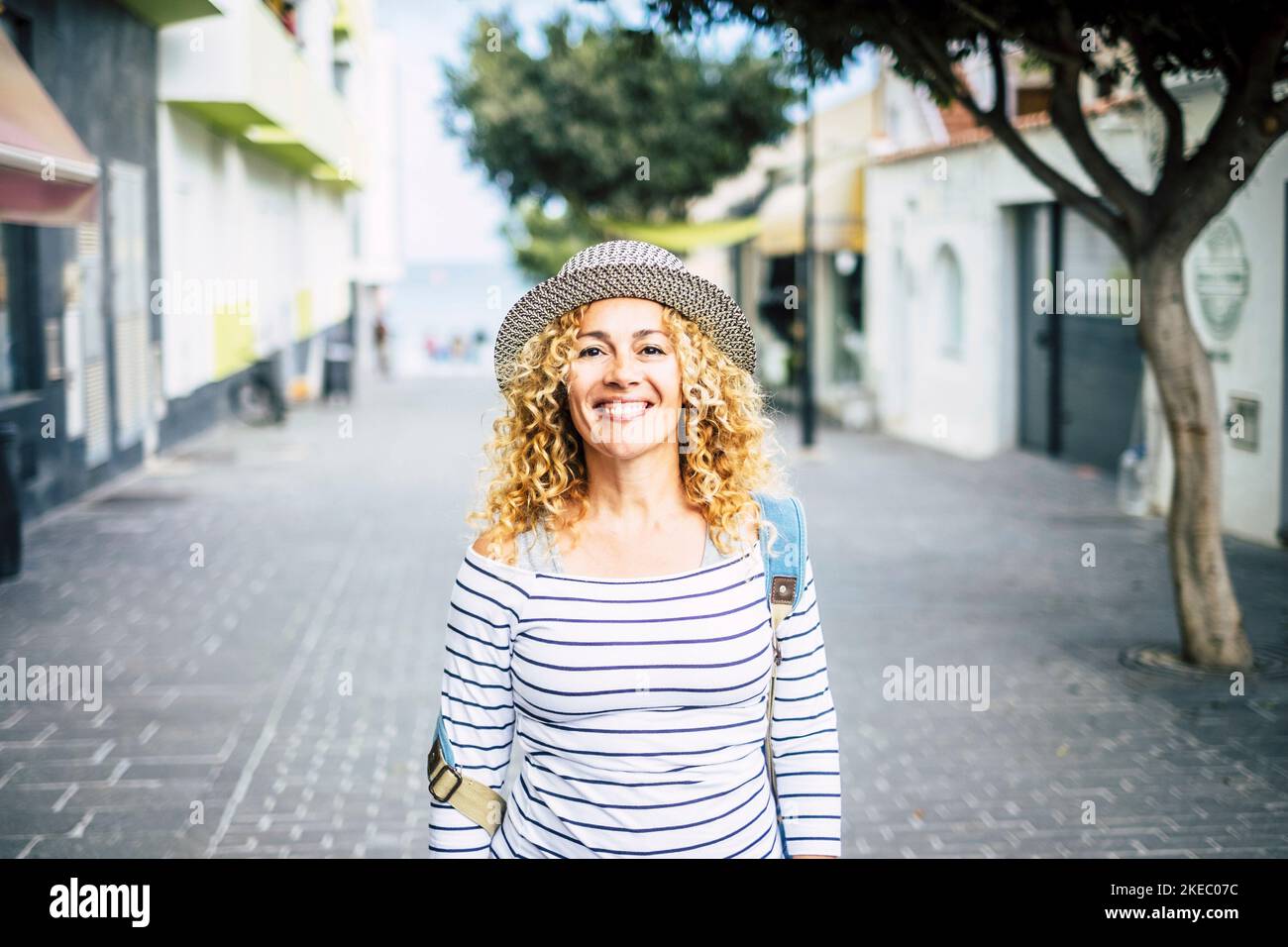 Beautiful woman walking street hi-res stock photography and images - Alamy