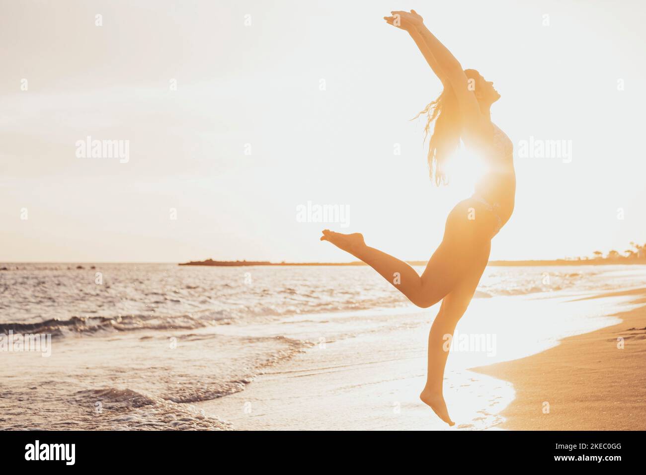 Healthy woman jumping hi-res stock photography and images - Alamy