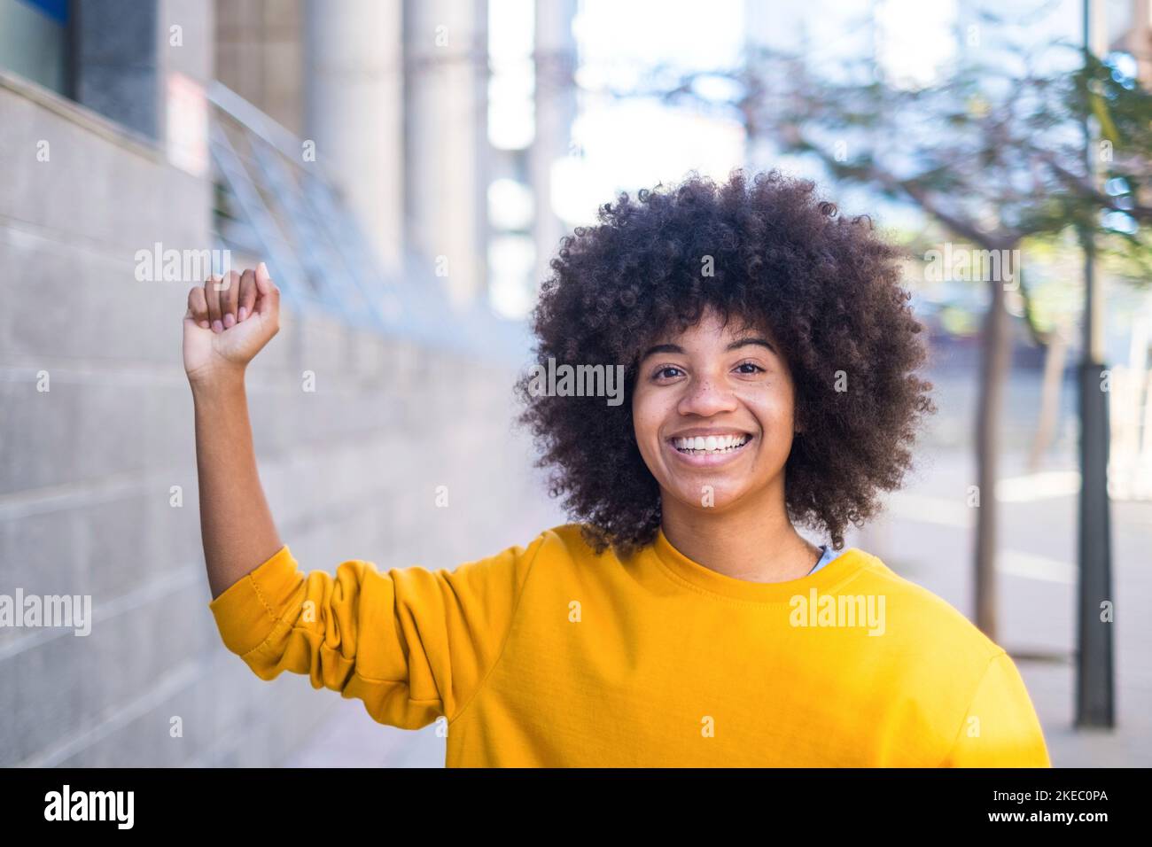 Black Lives Matter concept. One serious young african or american woman ...