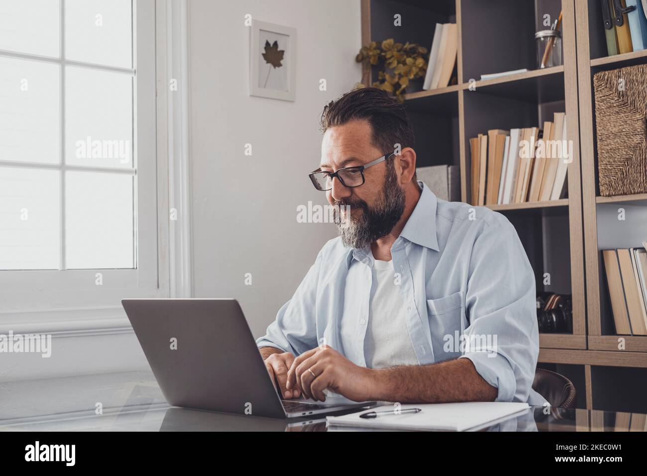 Adult male reading book hi-res stock photography and images - Alamy