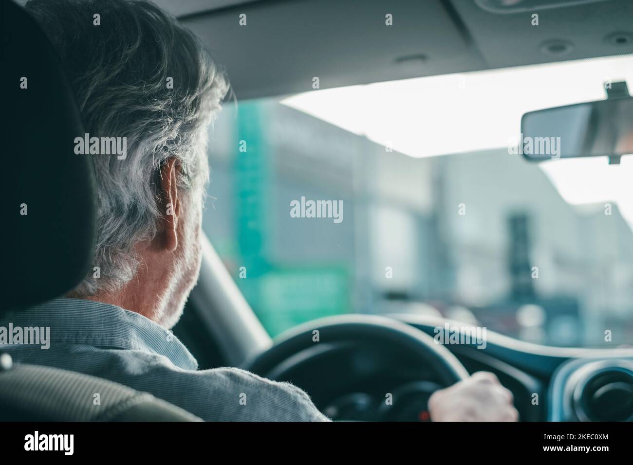 Old man driving car hi-res stock photography and images - Alamy