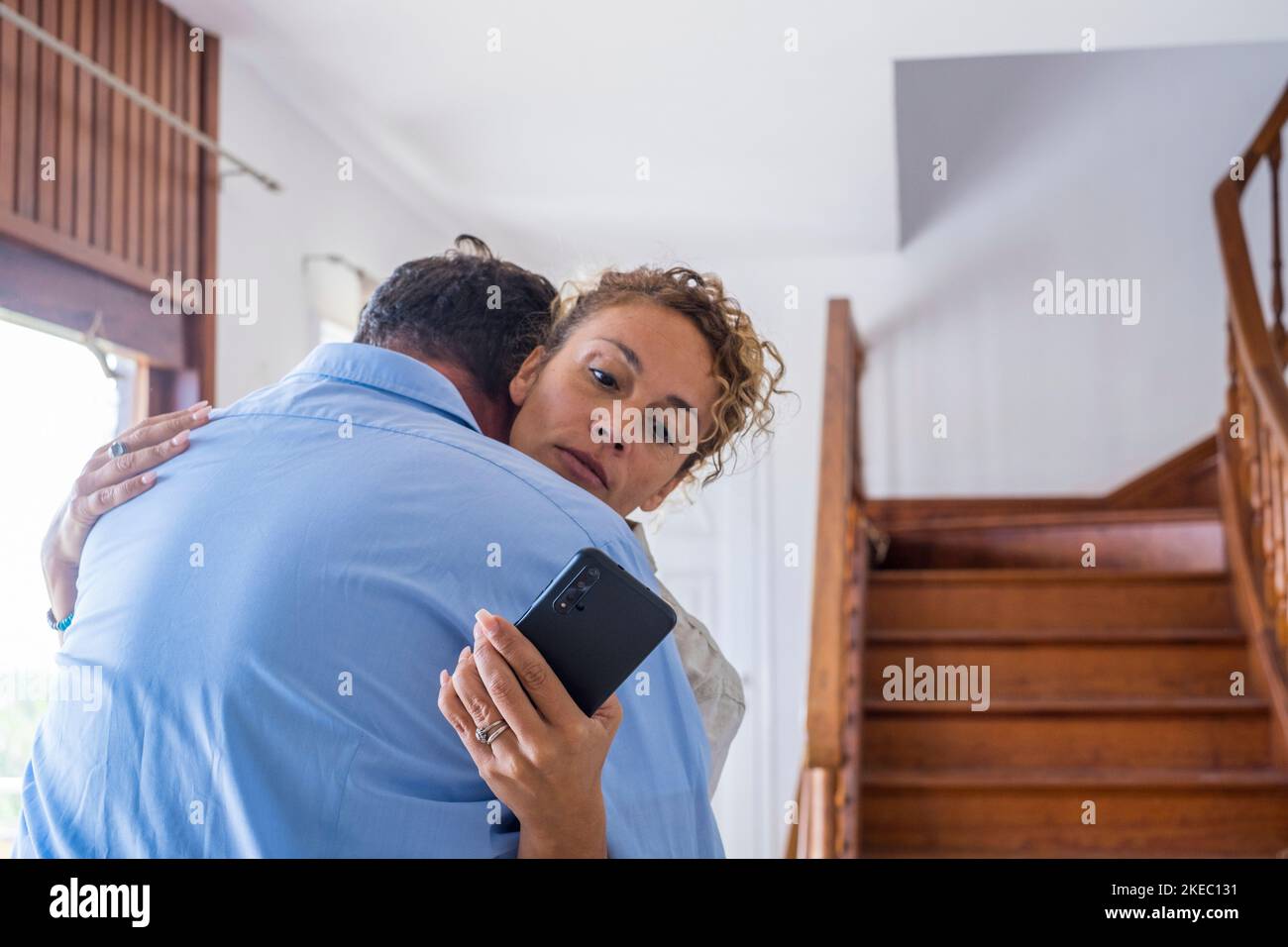 Cheater woman sending text message to lover using mobile phone while ...