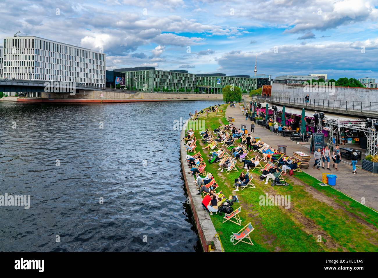 on the bank cafe in summer next to river Spree in Mitte Berlin, Germany ...