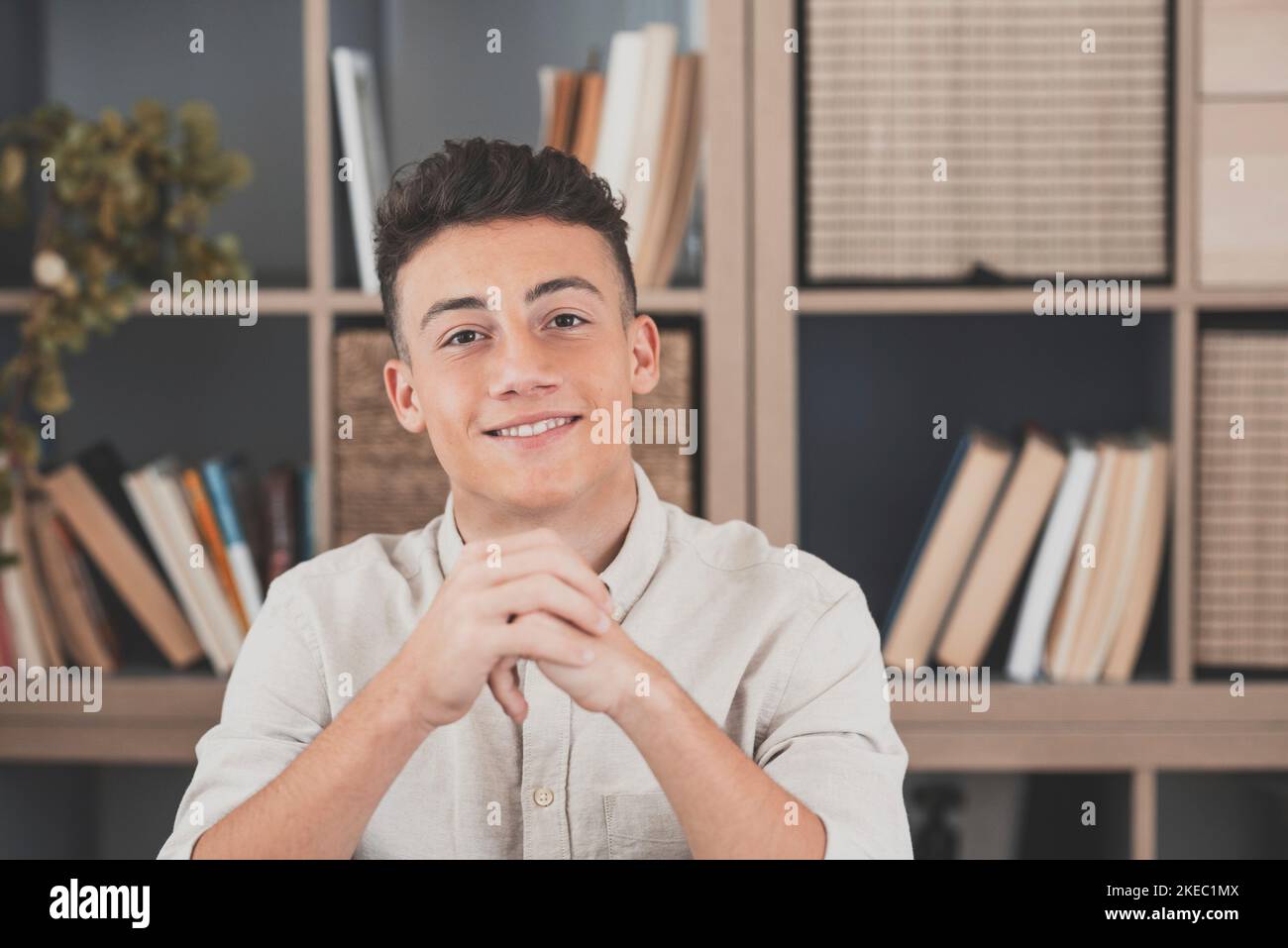 Portrait of one young and happy cheerful man smiling looking at the ...