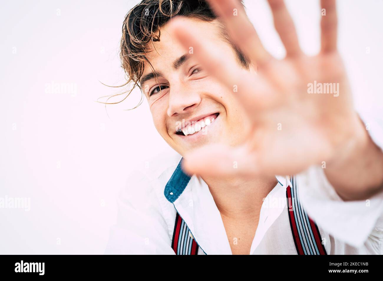 one handsome and beautiful millennial or teenager smiling and looking ...