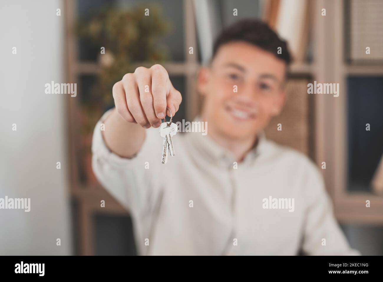 Hand holding bunch keys hi-res stock photography and images - Alamy