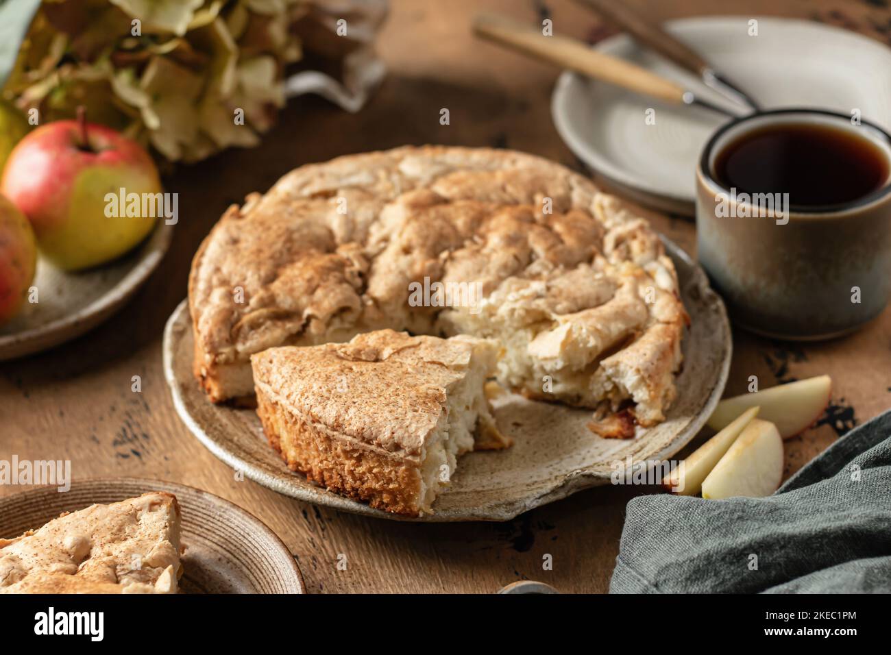 Apple pie charlotte on wooden background. Tea time with apple dessert ...