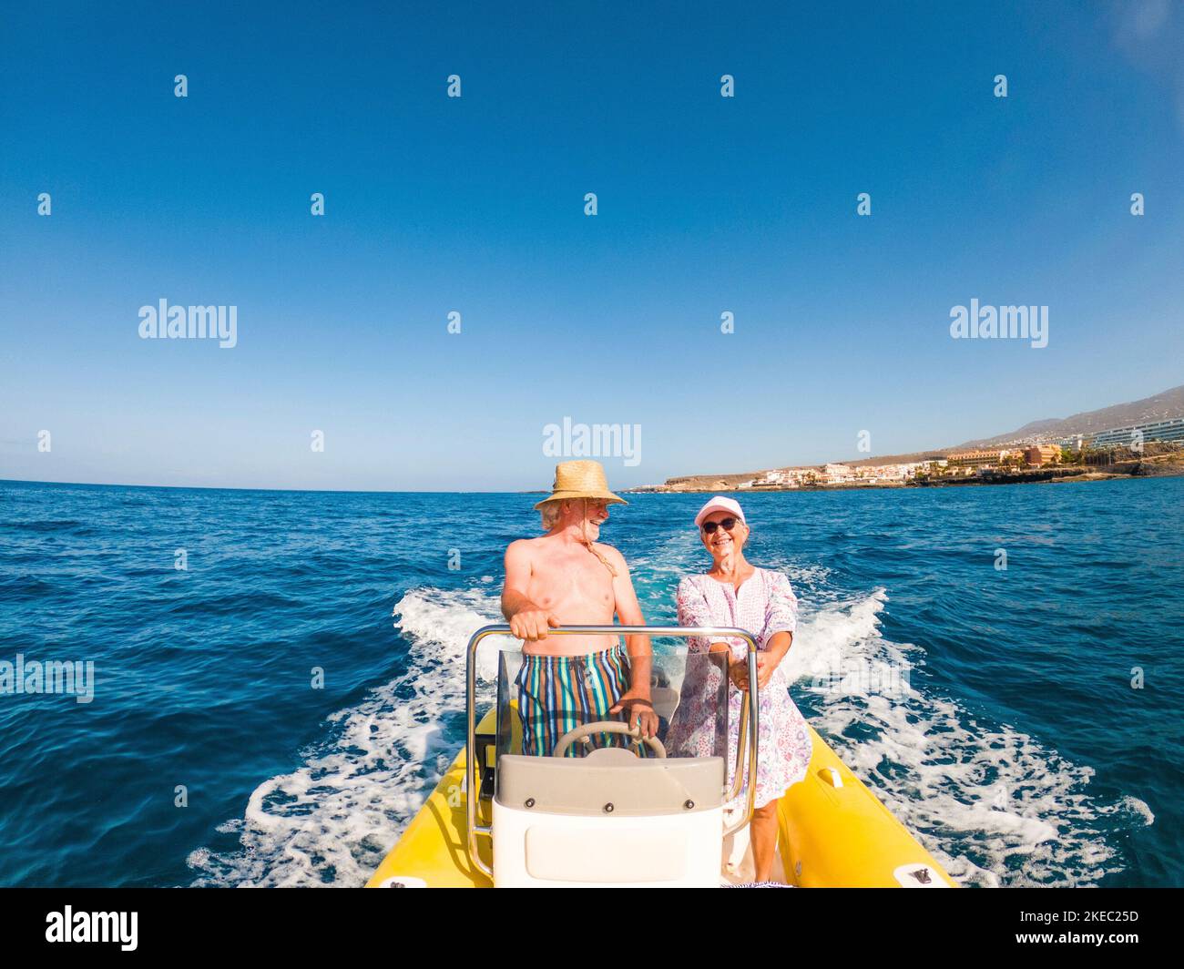 Woman driving boat hi-res stock photography and images - Alamy