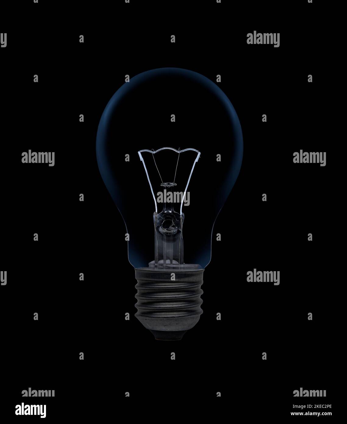 Light bulb with filament isolated on black background Stock Photo - Alamy