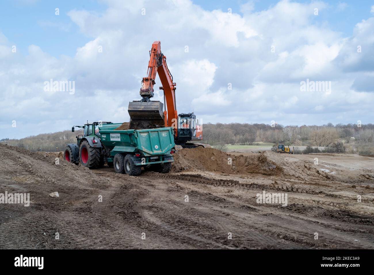 Construction site with excavator and tractor in summer Stock Photo - Alamy