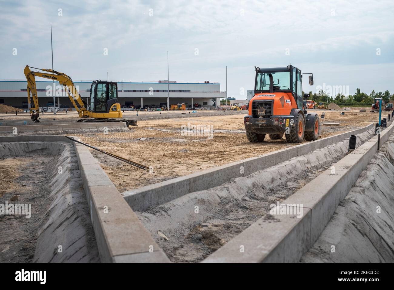Construction site with excavator and bulldozer in summer Stock Photo ...