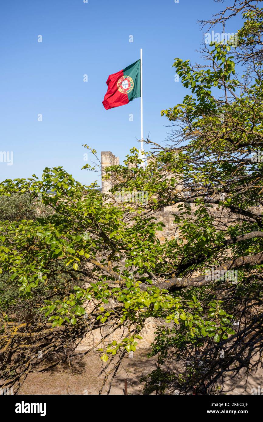 Portuisian flag on Castelo de Sao Jorge castle in Lisbon in summer ...