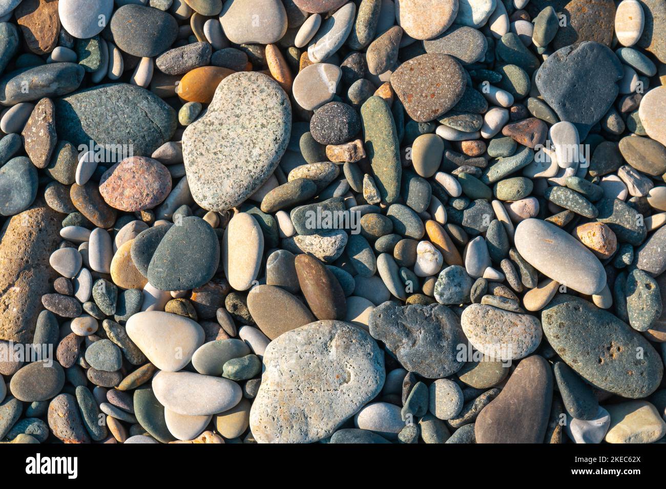 Rounded grey granite rocks beach hi-res stock photography and images ...
