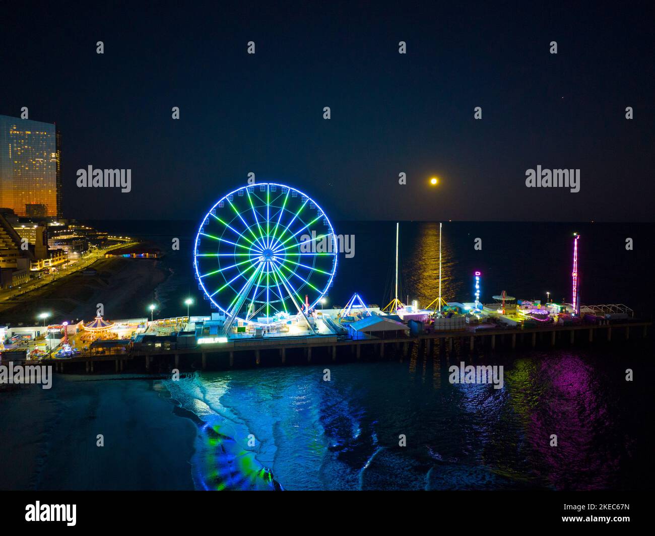 Night scene of Ferris Wheel on Steel Pier next to Boardwalk in Atlantic ...