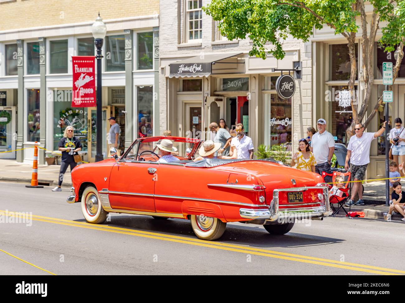 an antique red convertible in the franklin rodeo parade Stock Photo - Alamy