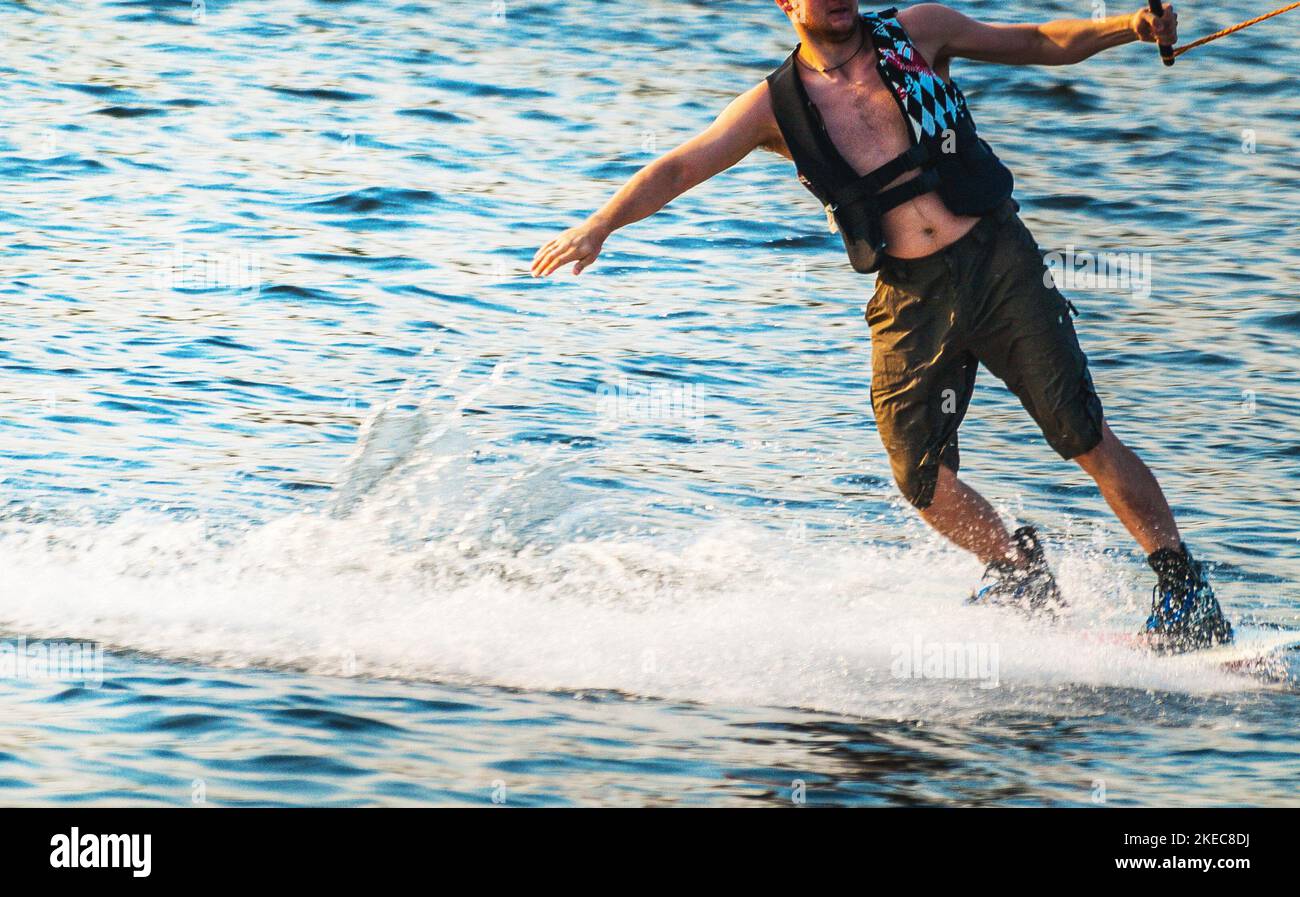 cable wakeboarding, wakesurfing at cable wake park Stock Photo - Alamy